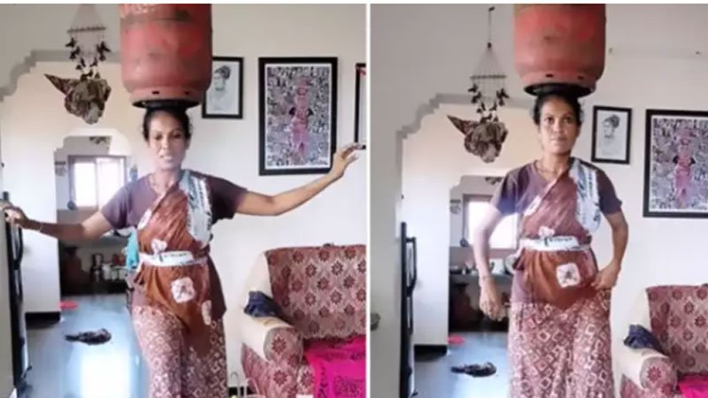 VIDEO : માથે ફૂલનો ગરબો નહીં ગેસનો બાટલો લઈને ઘુમી મહિલા, ઘરમાં ...