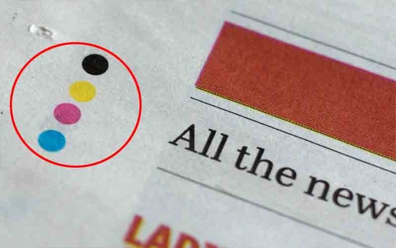 What Does The Four Colored Dots On A Newspaper Means?